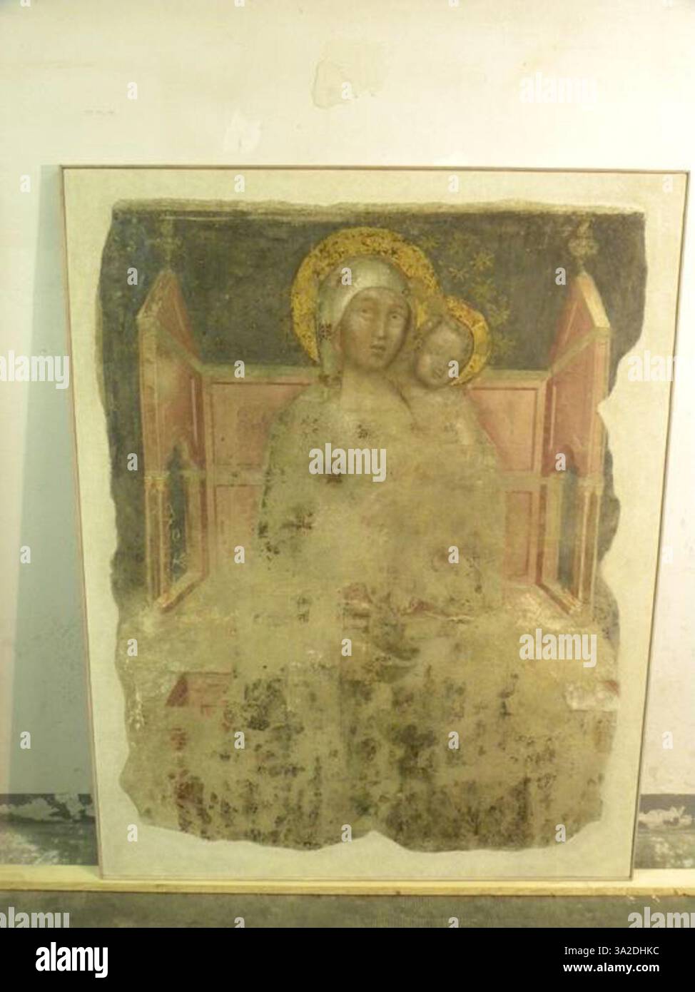 'La Madonna in Trono col Bambino' by Tommaso da Modena, circa 1348, depicts the Virgin Mary ...