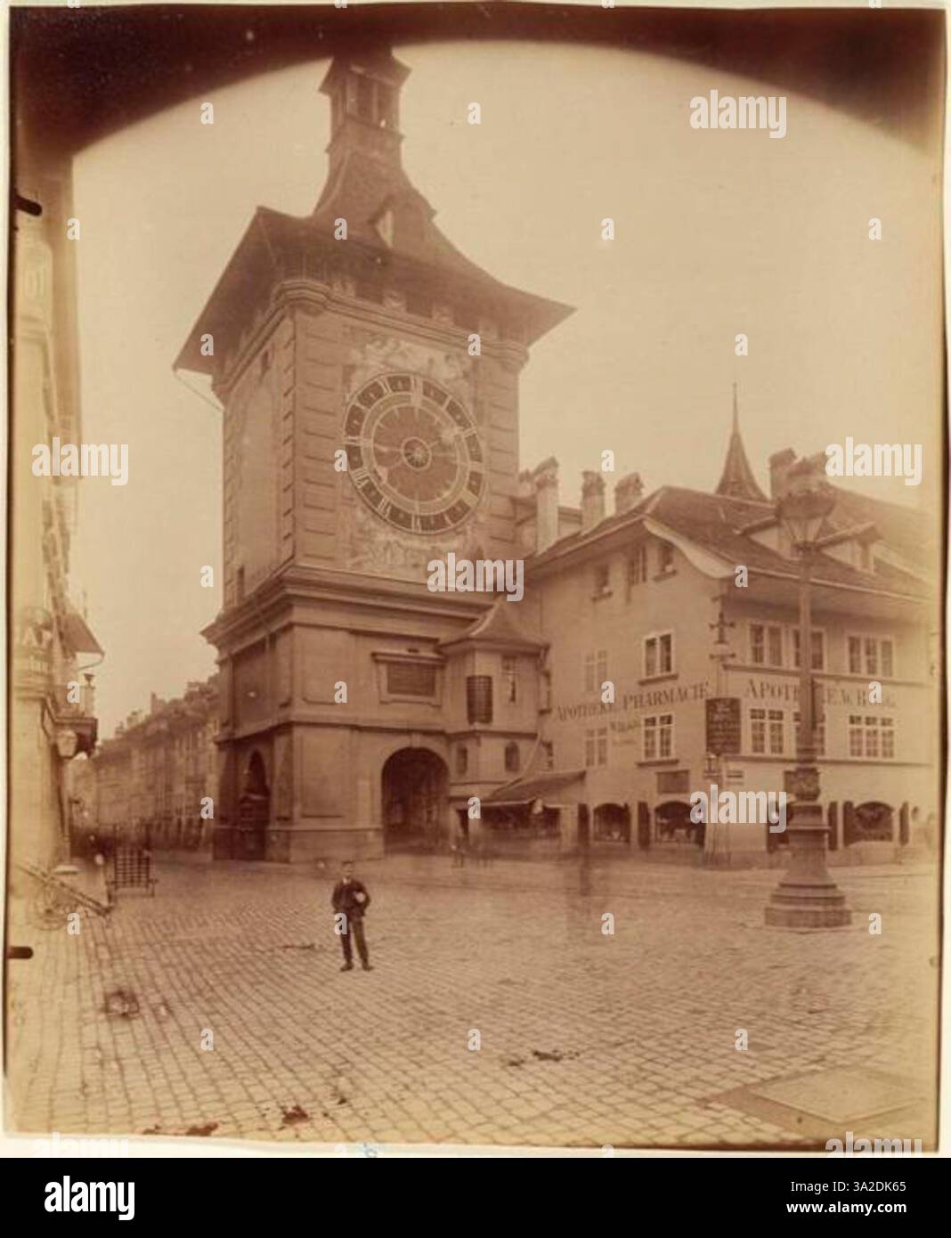 This photograph by Atget captures a street scene in Bern, Switzerland ...