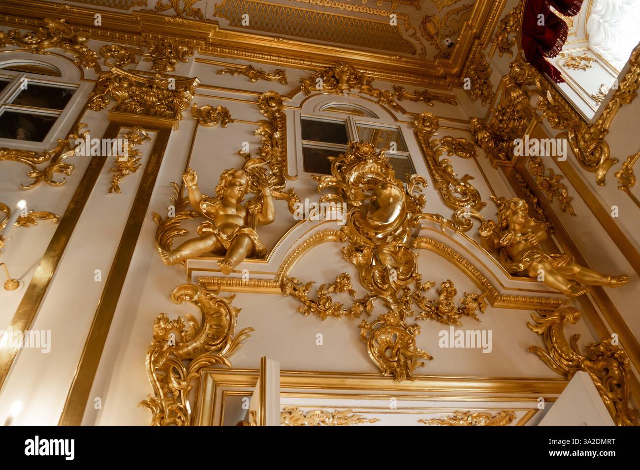 Ornate golden embellishments and sculptures decorate the walls of a ...
