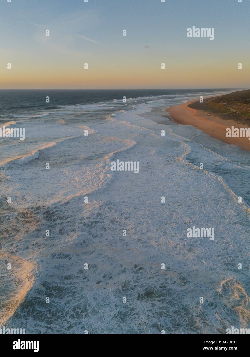 Aerial view of sunset landscape in Praia do Norte (North Beach), listed ...