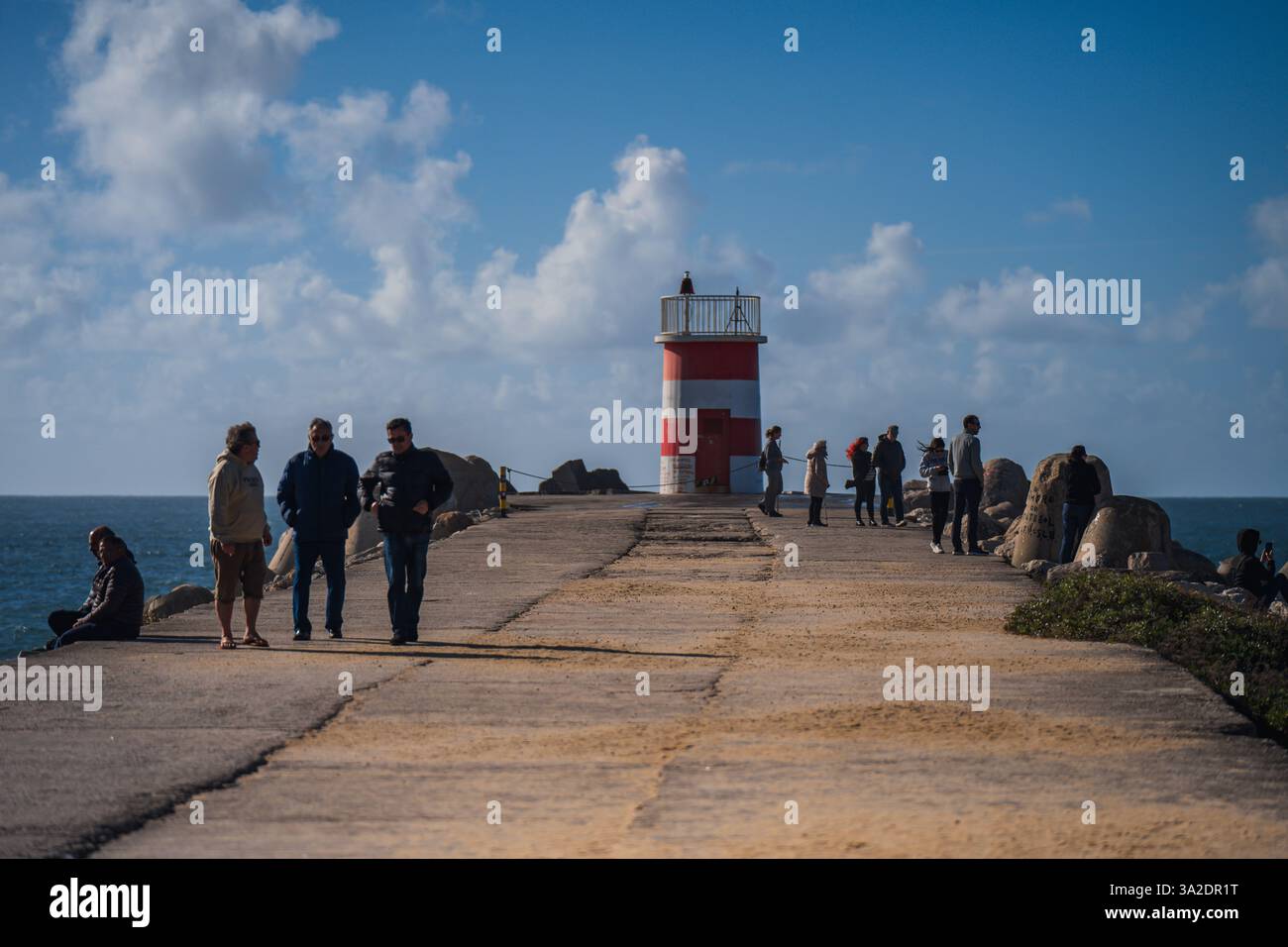 People in Farol Nazare Pontao Norte lighthouse, Nazare Stock Photo - Alamy