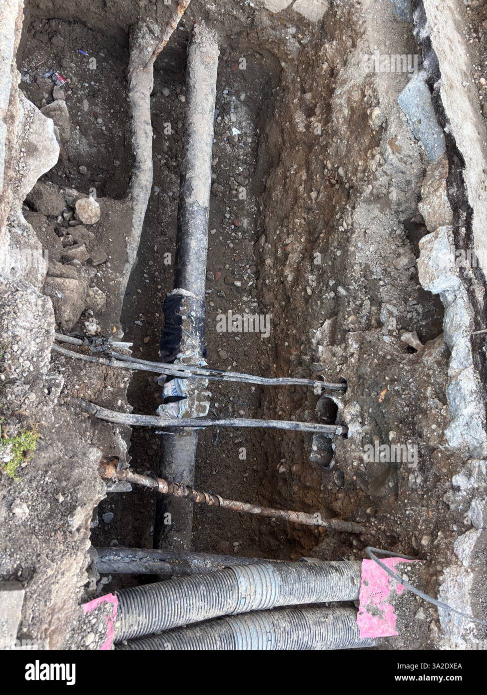 Pipes and communication cables in trench, underground utility systems ...
