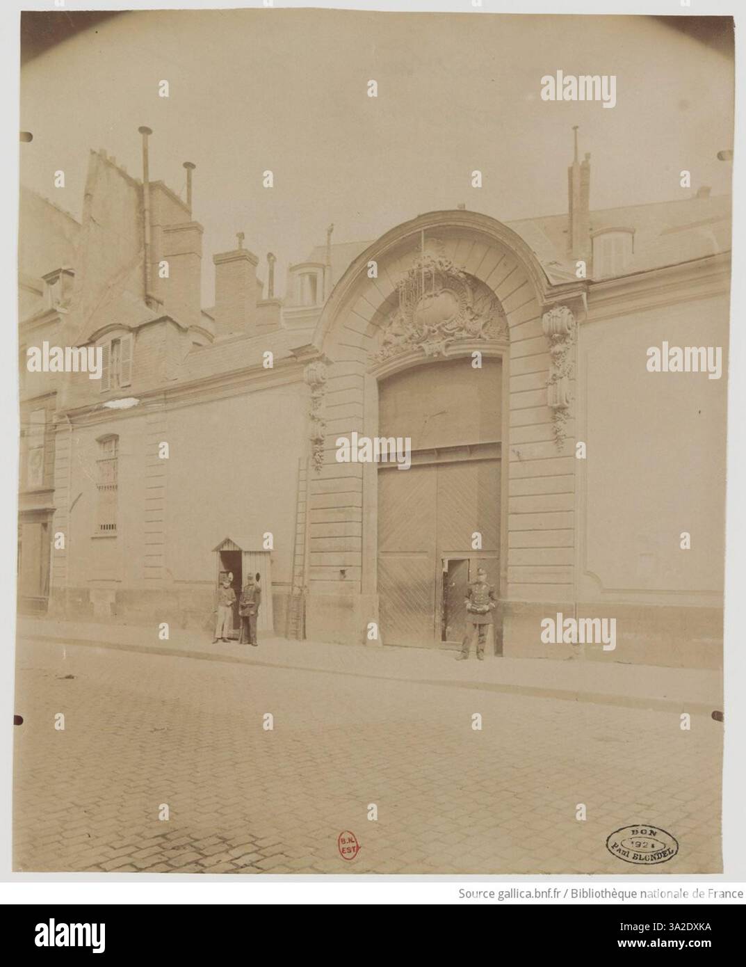 This photograph by Eugène Atget captures Rue du Cherche-Midi in Paris ...