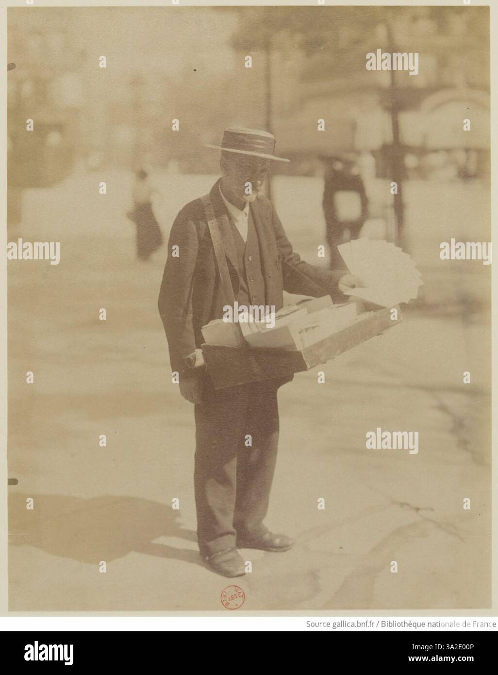 This photograph by Eugène Atget depicts a stationery vendor’s stall in ...