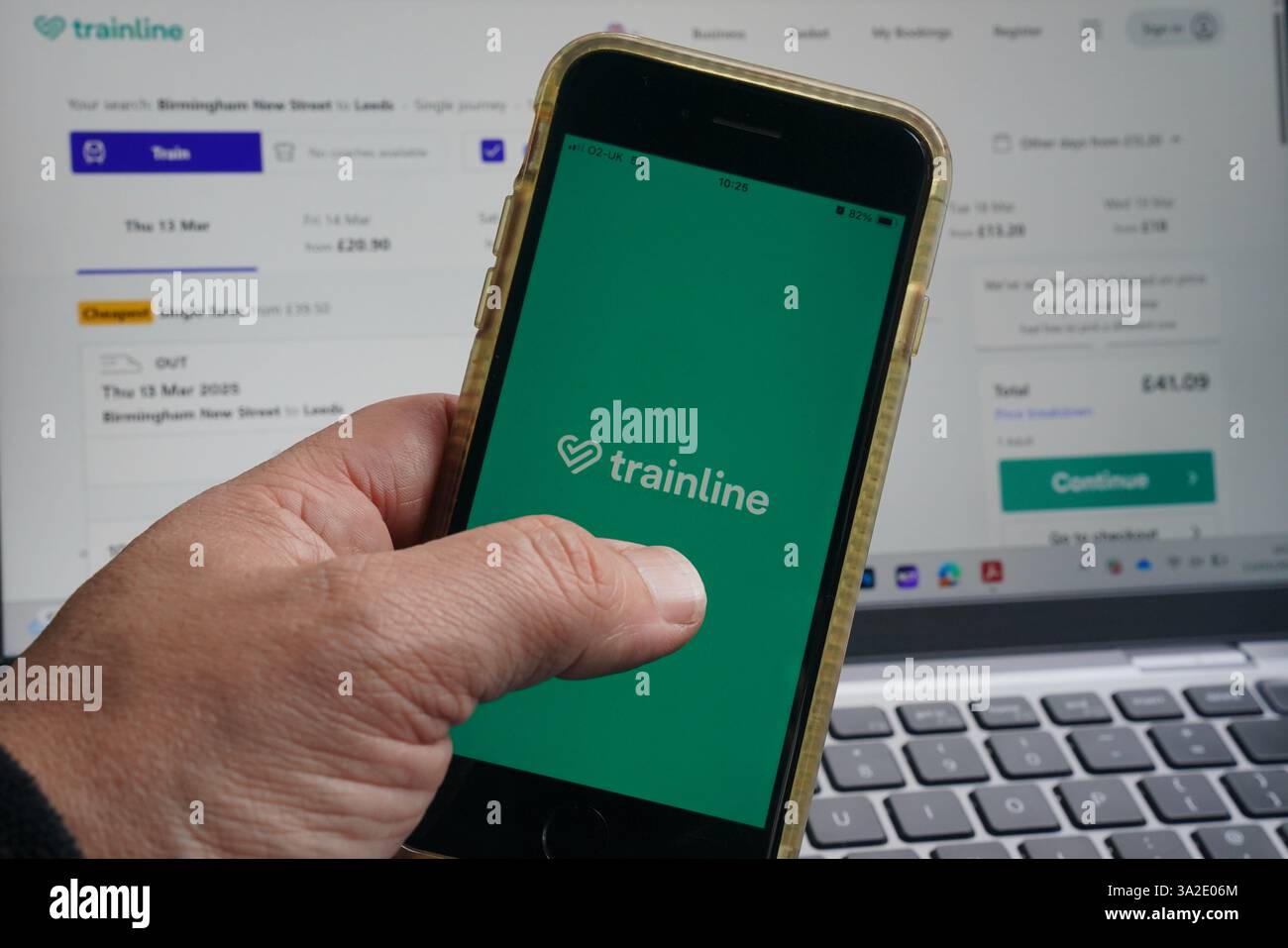 A laptop and phone showing the Trainline app and webpage. Trainline has ...