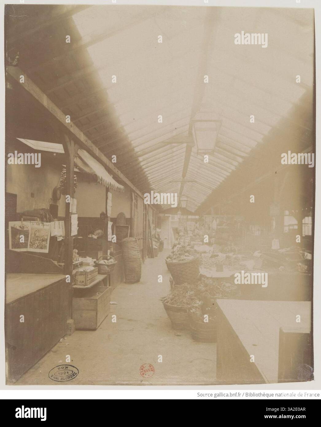 This 1899 photograph by Eugène Atget captures the market at Marché des ...