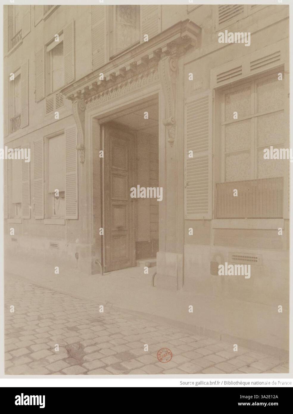This photograph by Eugène Atget shows the Hôtel Richelieu at 18 Quai de ...