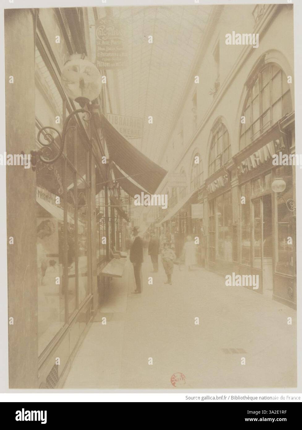 This photograph by Atget captures the Passage Choiseul at 40 rue des ...