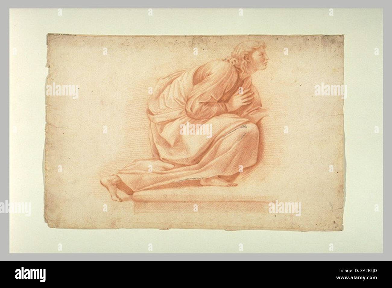 This copy of Raphael's work shows a young man draped and kneeling ...