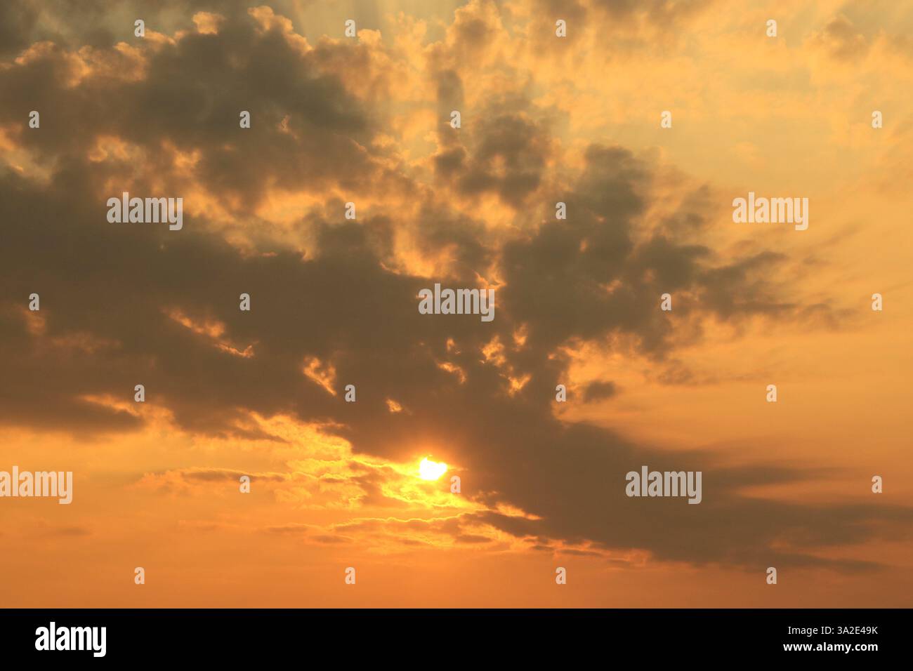 Evening sunlight with overcast clouds background. Evening sun with dark ...