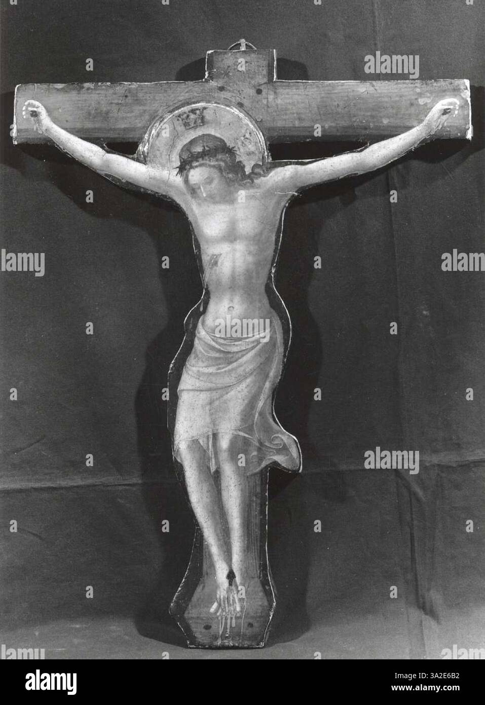 This painting by Fra Angelico depicts the Crucifixion of Christ, showcasing his mastery of ...