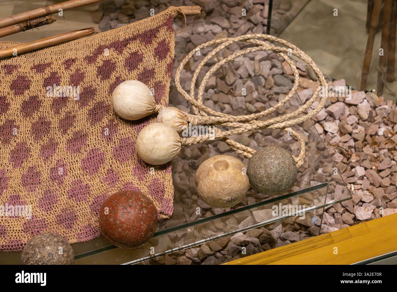 Pre-Hispanic indigenous stone bola balls & woven bag in the ...