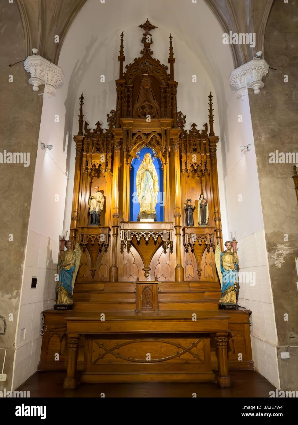 A statue of Mary in a side chepel in St. John the Baptist Church in ...