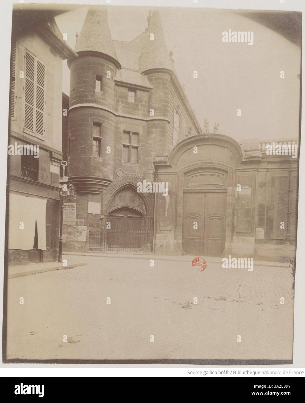 This photograph by Eugène Atget depicts the Archives in Paris in August ...