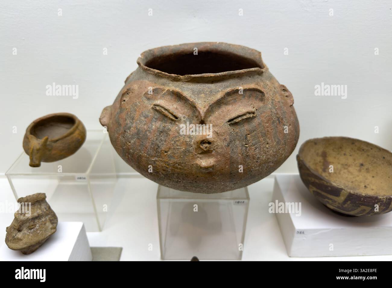 Pre-Hispanic indigenous Amerindian ceramic pottery with a face design ...