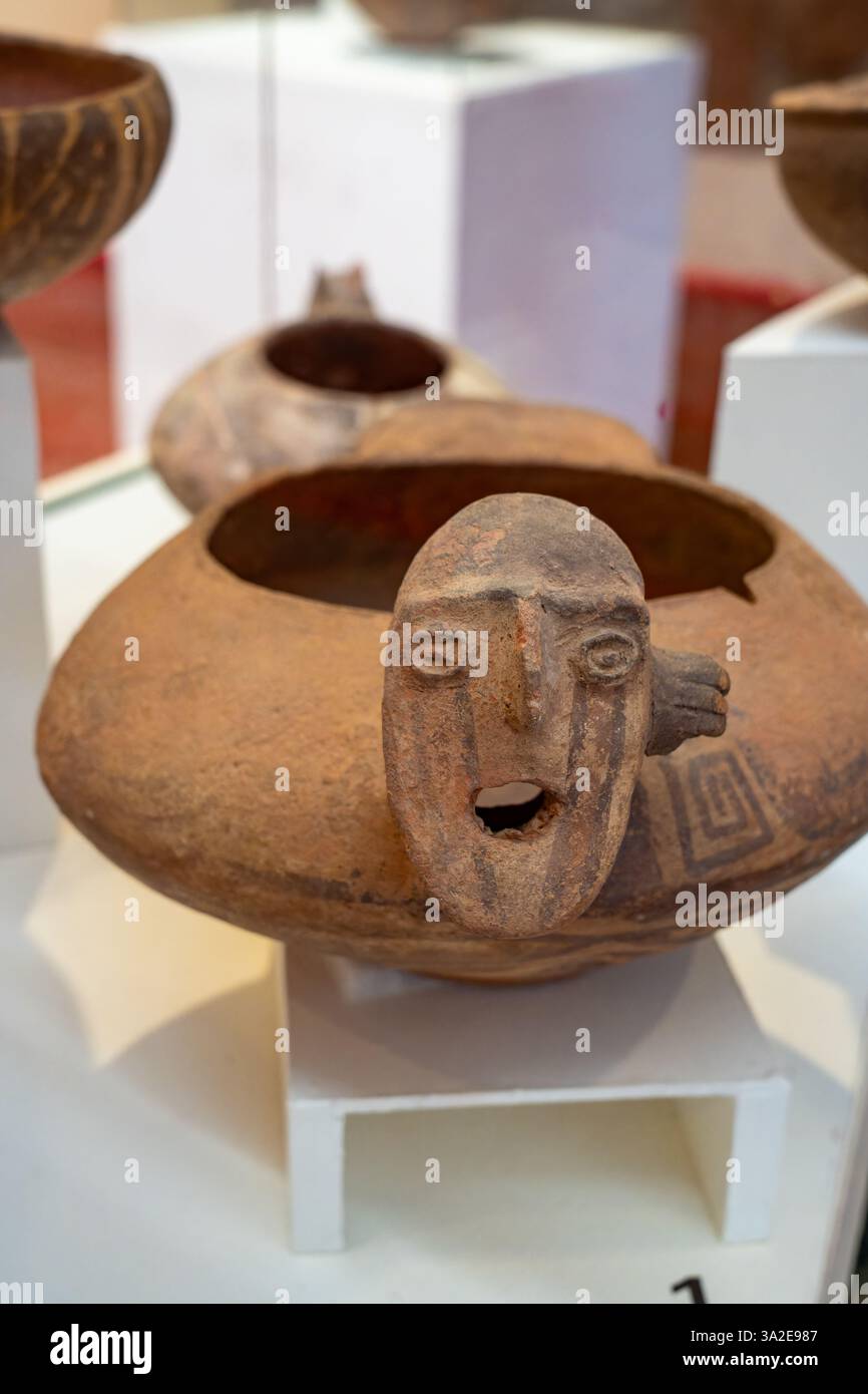 Pre-Hispanic indigenous Amerindian ceramic pottery with a human face in ...