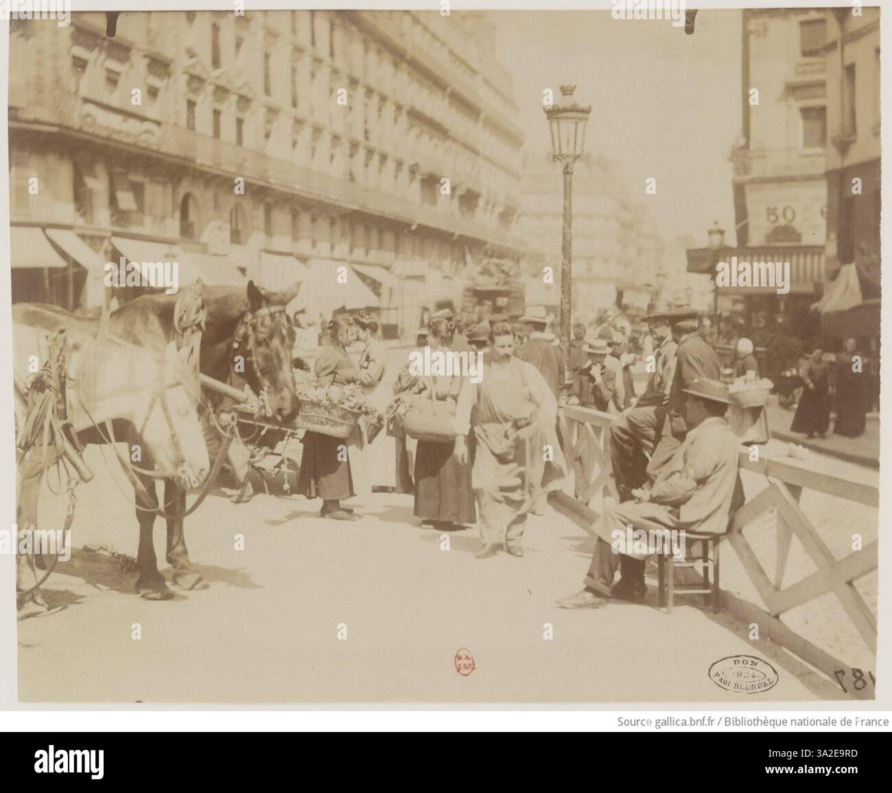 Taken by Eugène Atget, this photo features a corner of Rue Monge in ...
