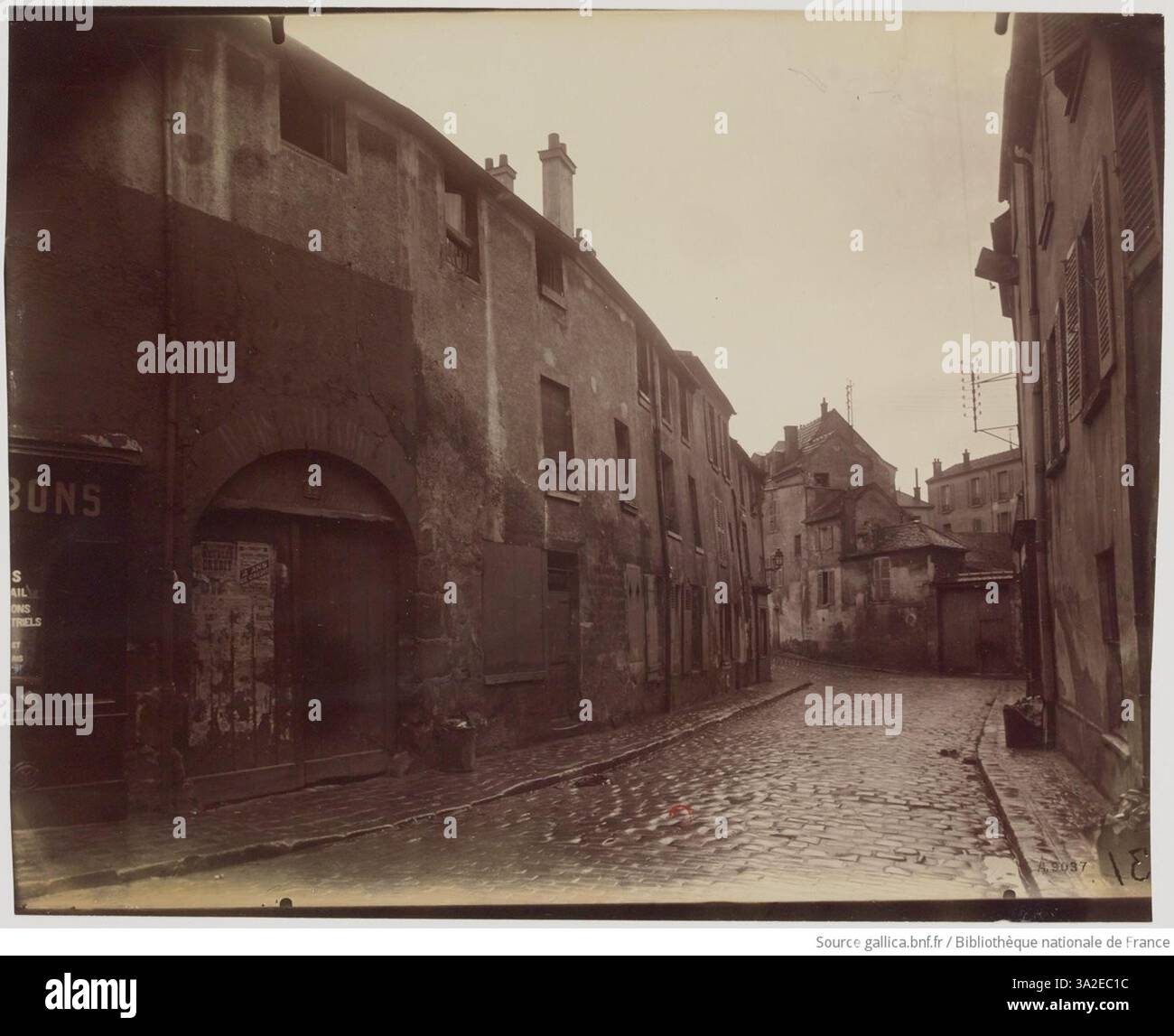 This image by Eugène Atget captures an old street in Vanves, Paris ...