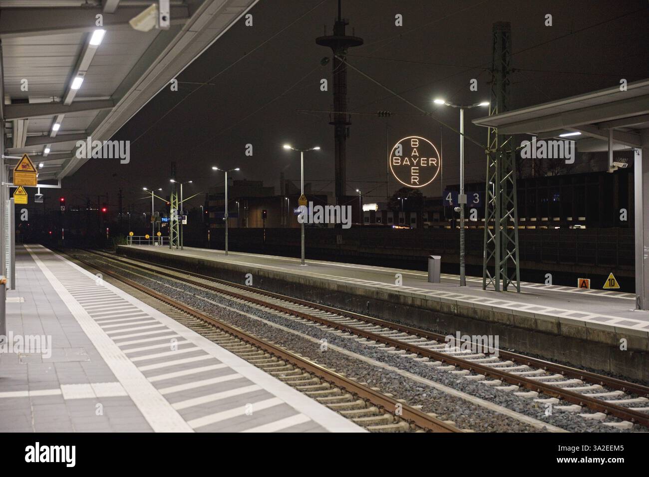 Bayer Cross seen at night from Leverkusen-Mitte railway station ...