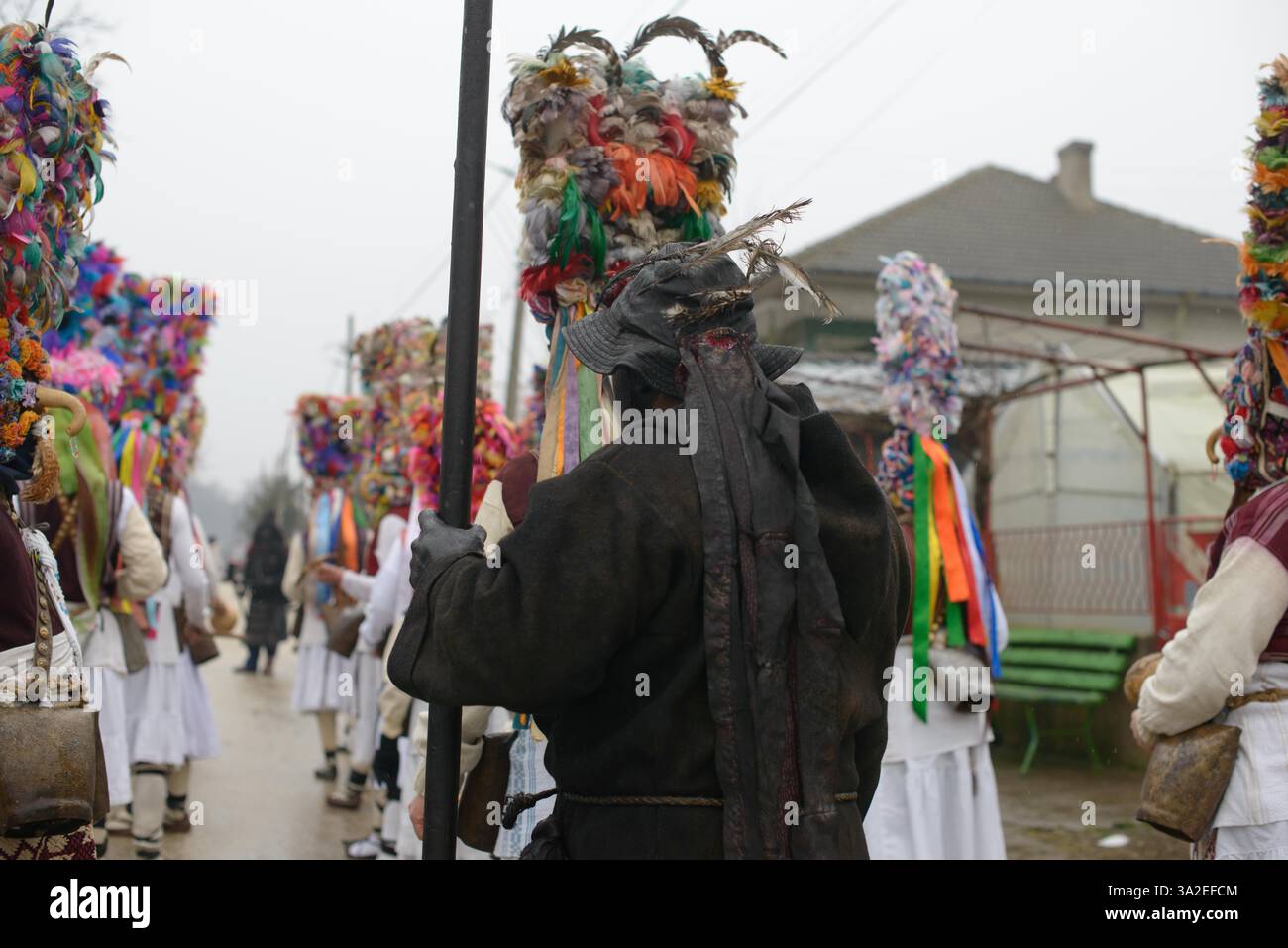 03/02/2025 - Kalipetrovo, Bulgaria: A row of Bulgarian Kukeri clad in ...