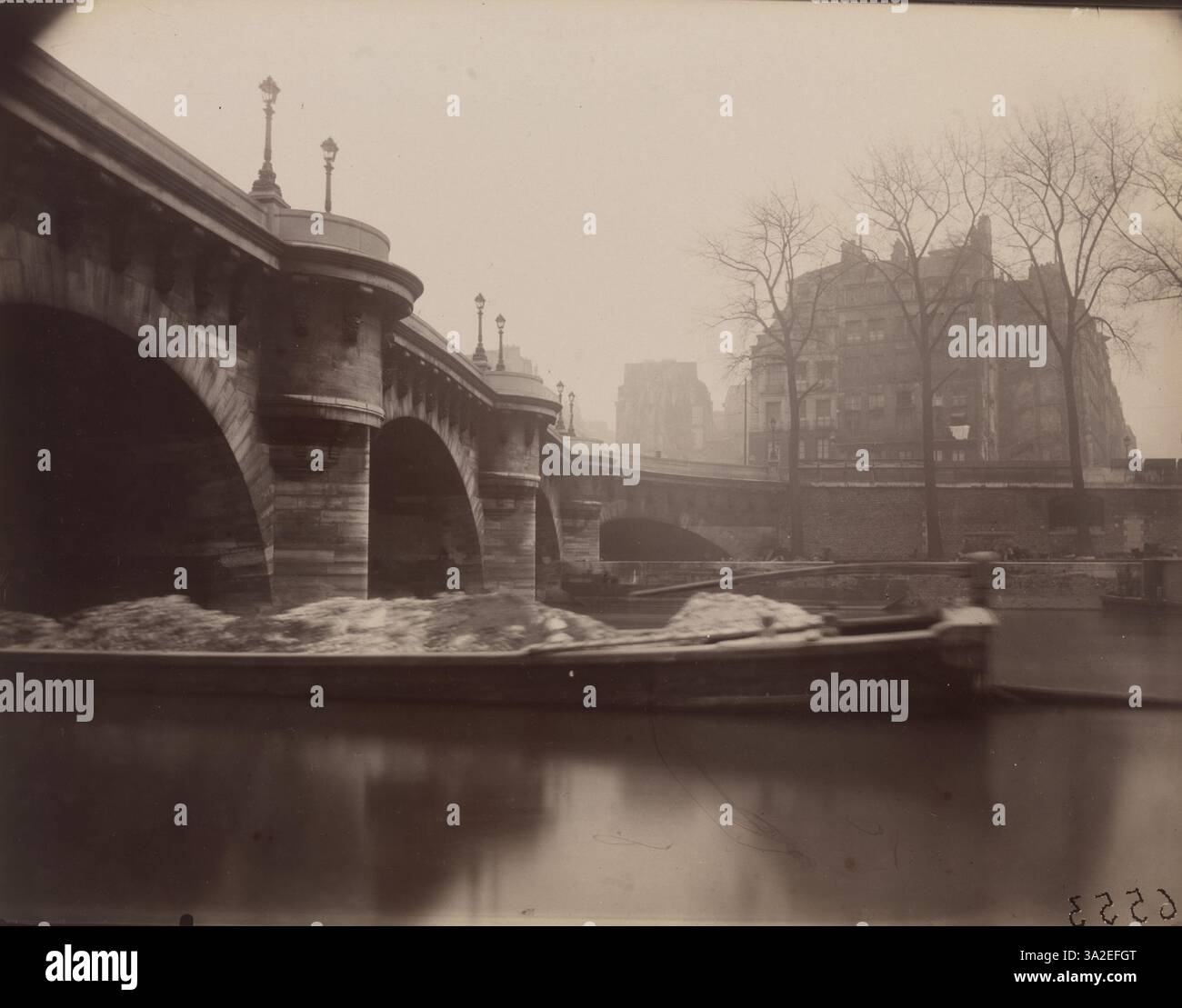 A 1925 photograph by Eugène Atget showing the Pont Neuf, one of Paris ...