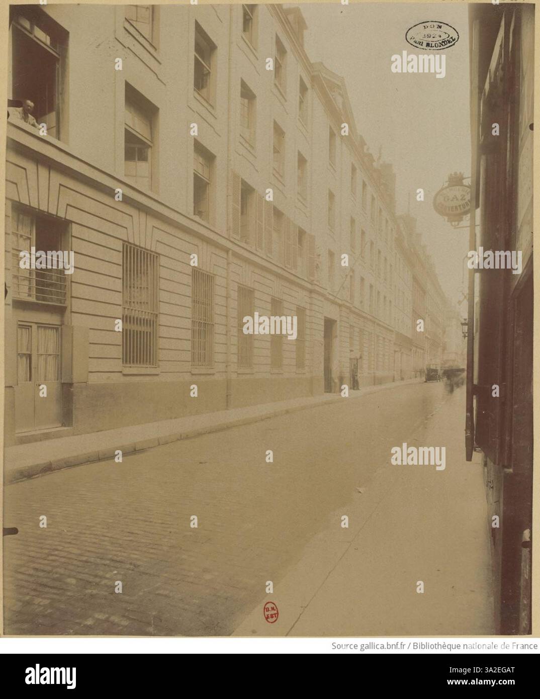 This photograph by Eugène Atget depicts a military barracks built in ...