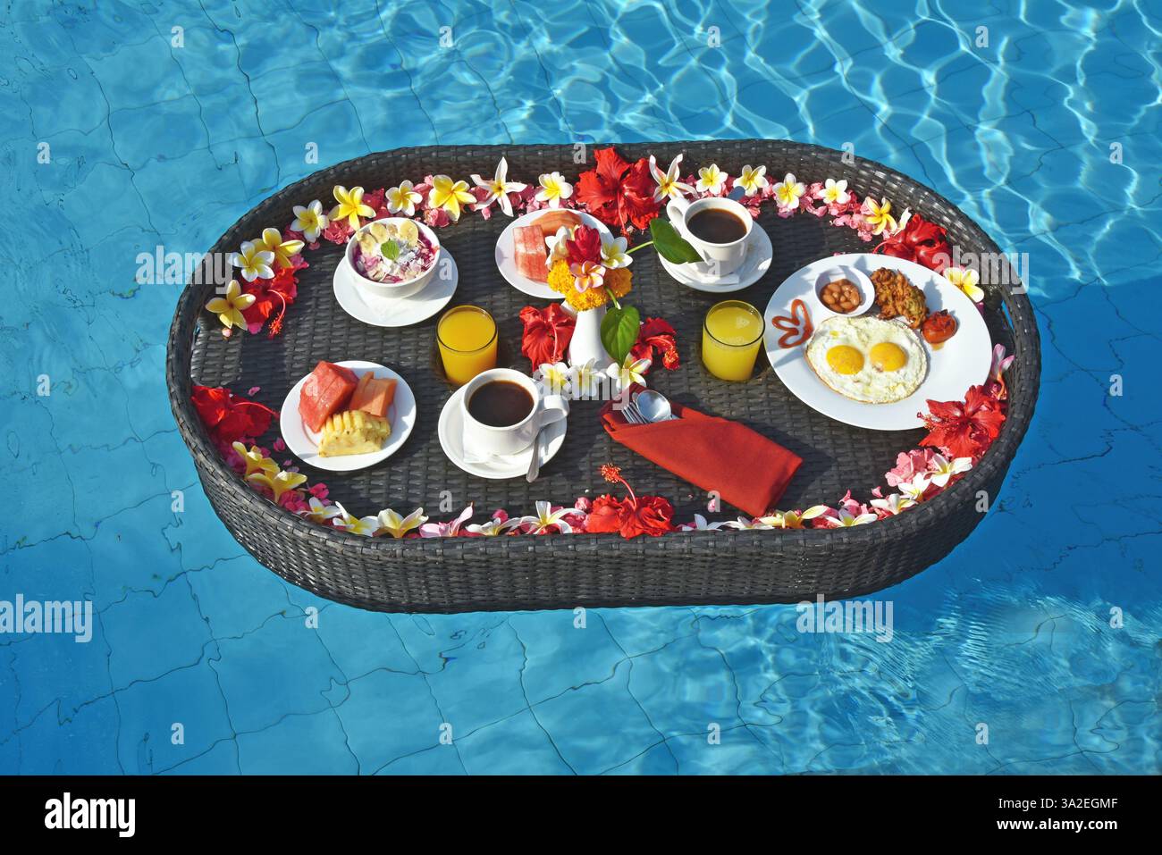 Breakfast tray in the pool for hotel guests, Indonesia, Bali Stock ...