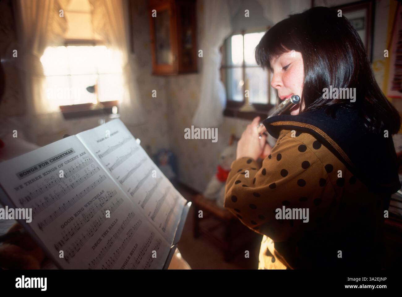 Playing flute in bedroom hi-res stock photography and images - Alamy