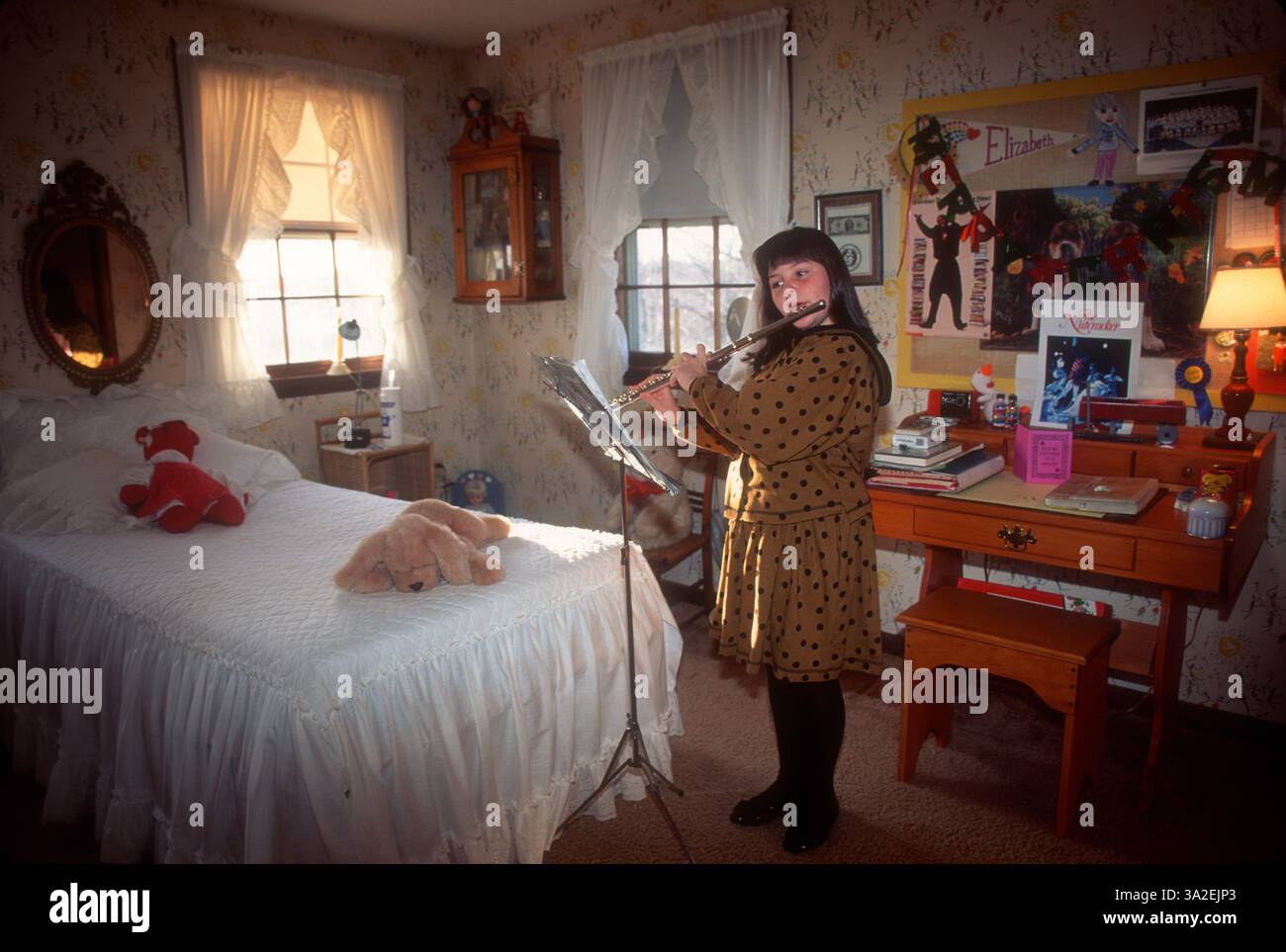 Playing flute in bedroom hi-res stock photography and images - Alamy