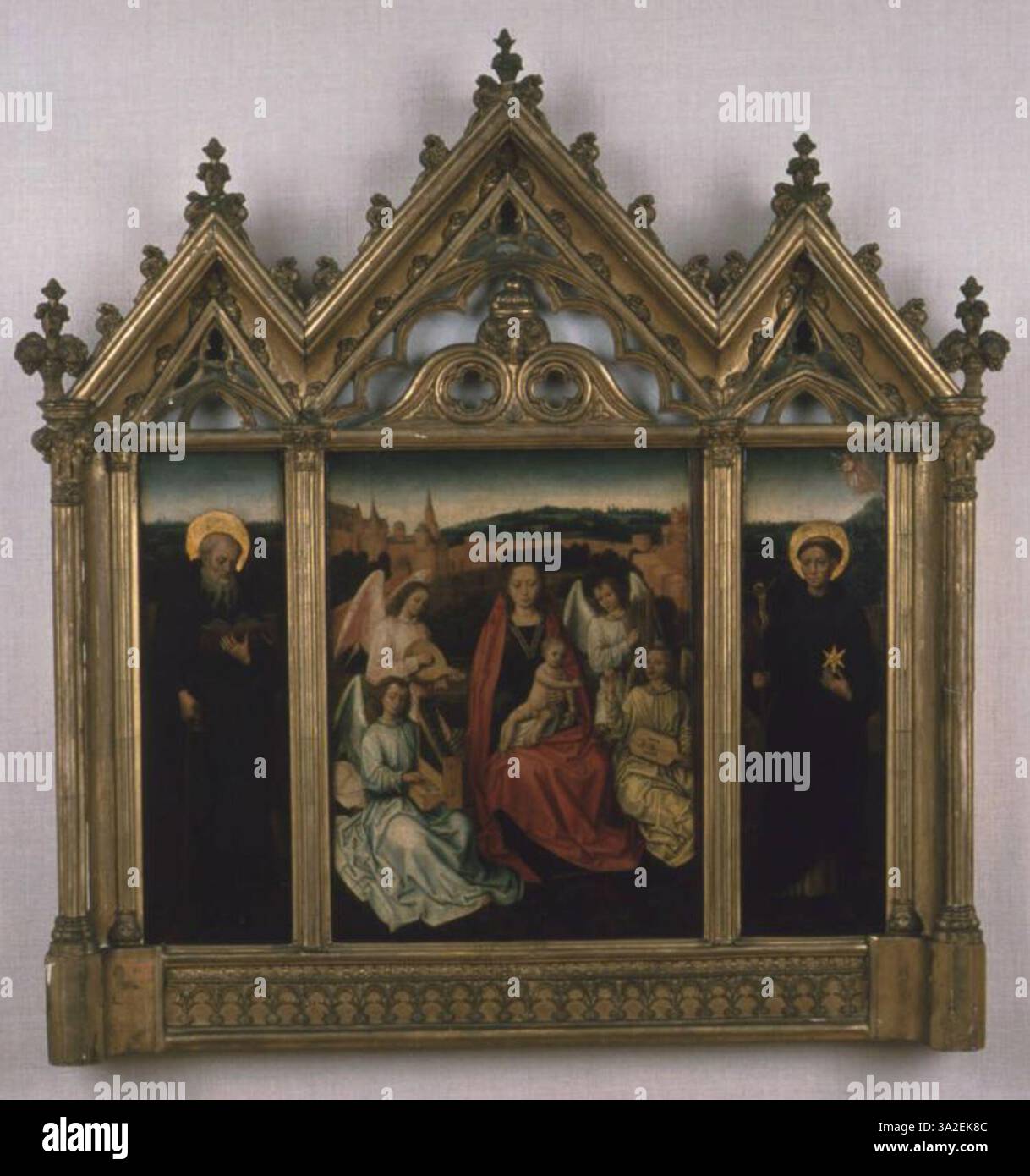 This work, attributed to a follower of Hans Memling, depicts the Virgin and Child surrounded by ...