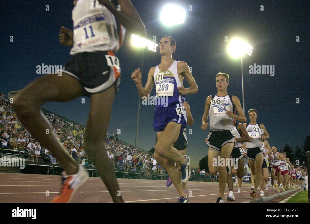 Alan Culpepper cq-left congratulates Abdihakim Abdirahman cq-rt after ...