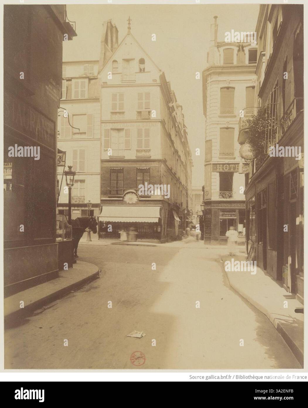 This photograph by Eugène Atget depicts the old house at 5 Place de l ...