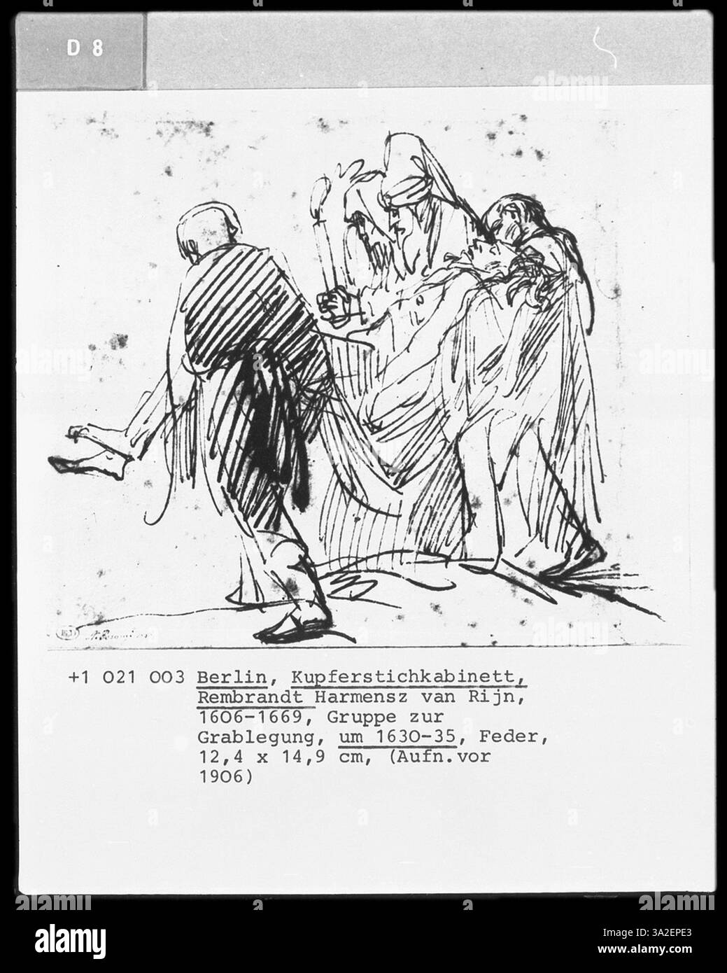 Rembrandt's depiction of a group around a burial scene, focusing on the ...