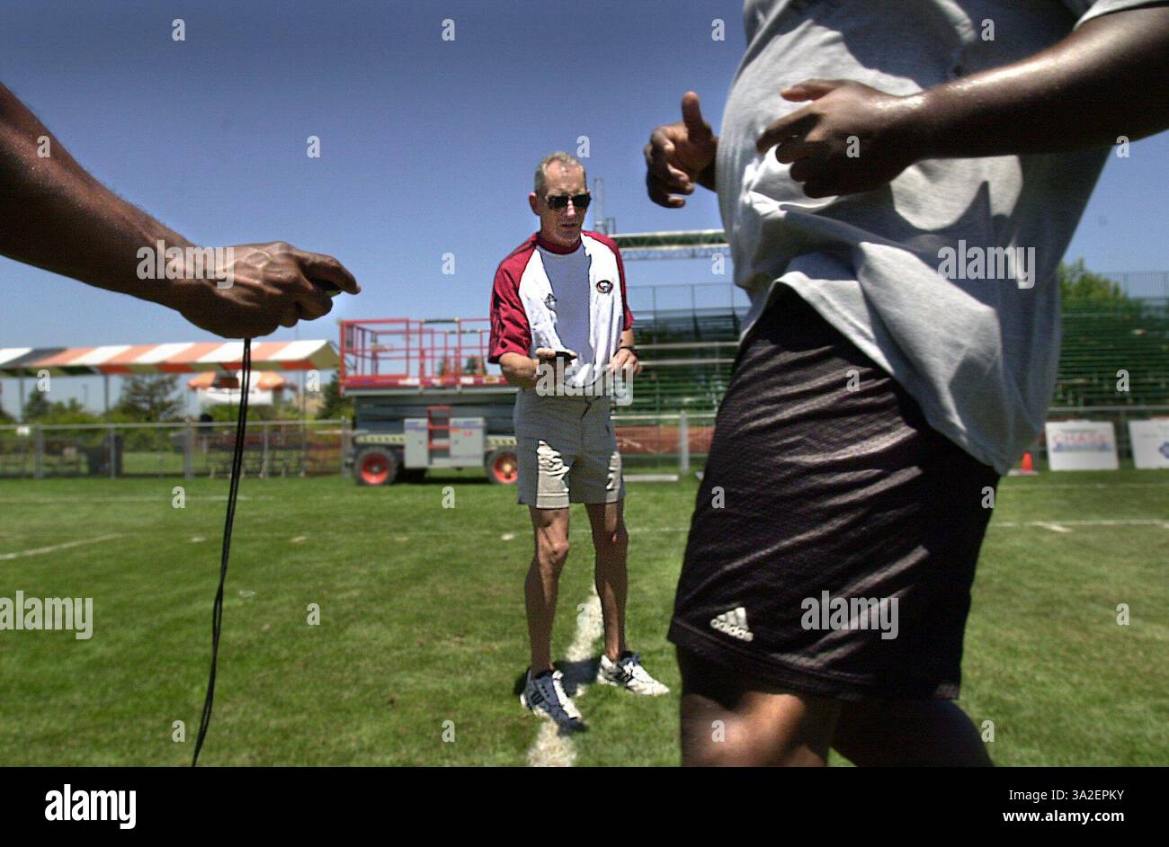 Strength and conditioning coach for the 49ers, Jerry Attaway works the ...