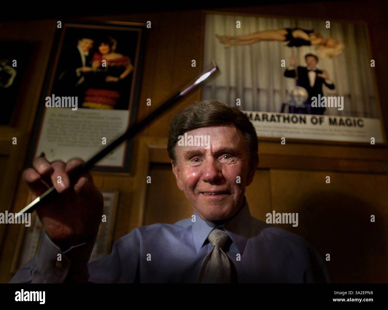 Bob Brown with his magic wand inside his home. He is the subject of ...
