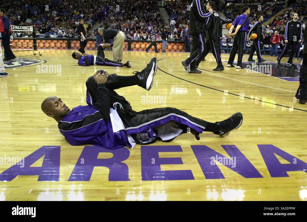 Bobby Jackson stretches his muscles before the game against the Spurs ...