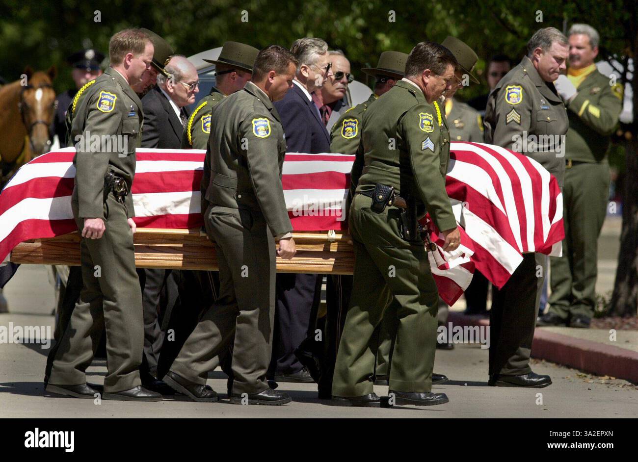 Butte County Sheriffs deputies bring the casket into the The ...