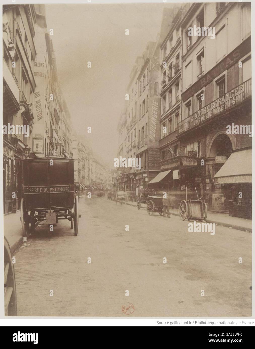 A photograph by Eugène Atget showing La Rue St-Denis from Rue de ...
