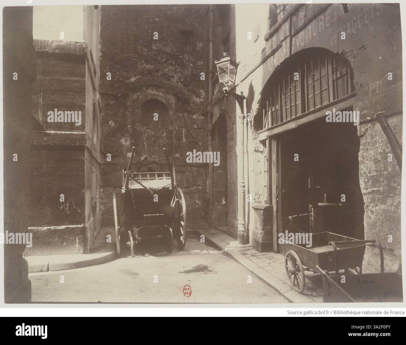 This photograph by Eugène Atget features Rue Eginhard, showcasing the ...
