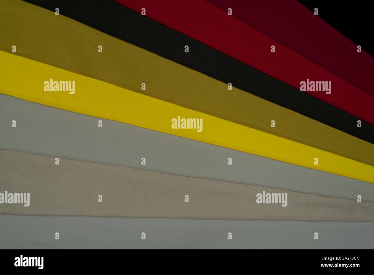 A collection of fabrics with a smooth texture, presented in bright and ...