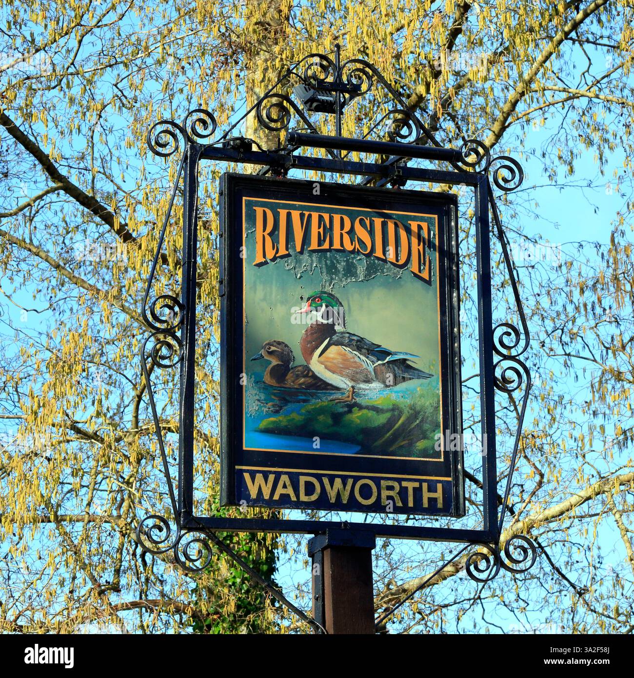 Roadside sign for the Riverside Inn Public House and Wadworth beers ...