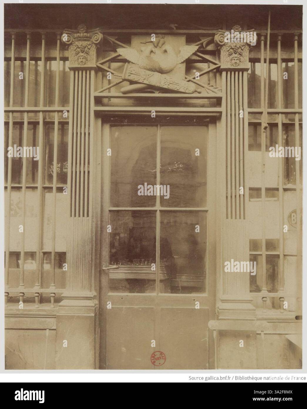 Eugène Atget's photograph of the shop sign 'Aux deux Pigeons' on Rue ...