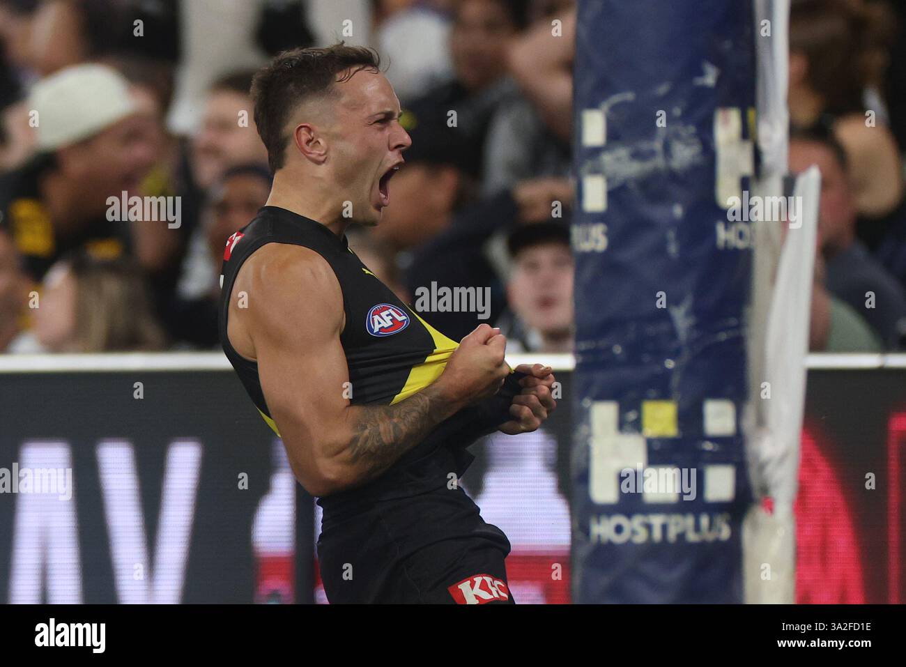 Rhyan Mansell of the Tigers celebrates kicking a goal during the AFL ...