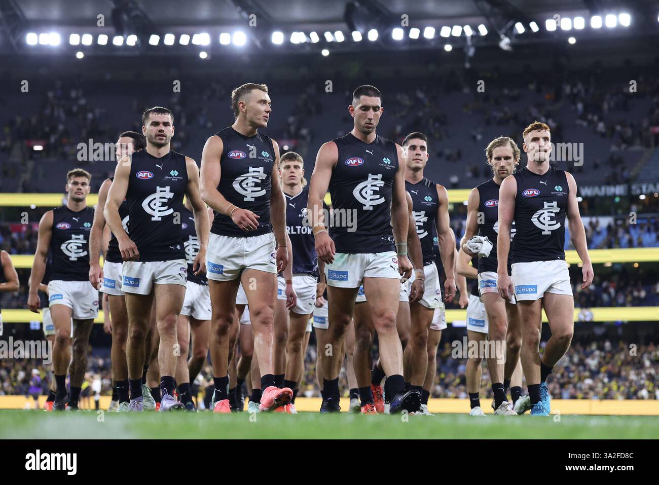 Melbourne, Australia. 13th Mar, 2025. Patrick Cripps of the Blues and Jacob Weitering of the ...