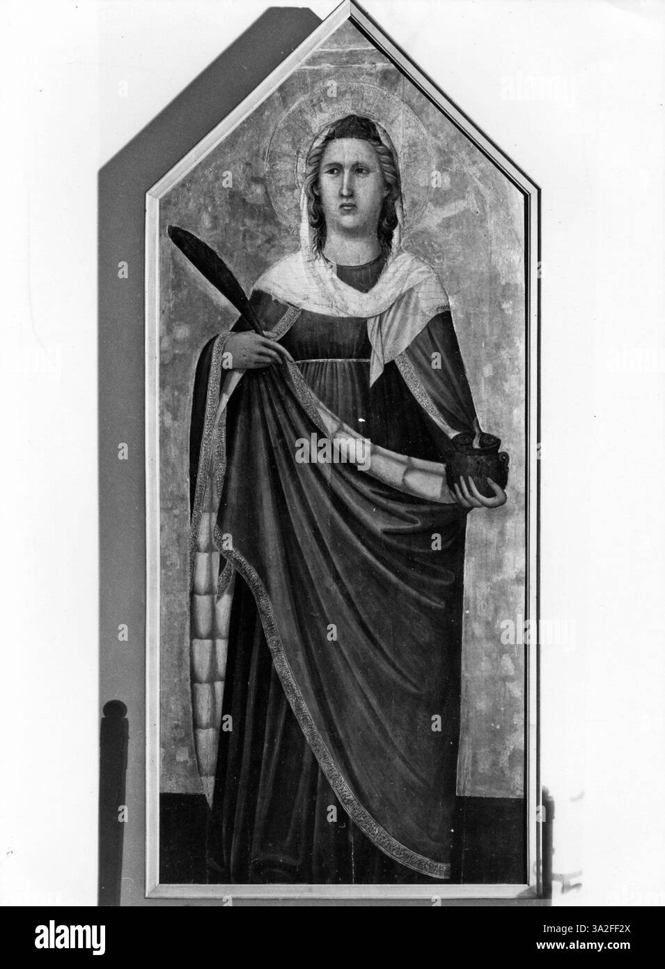 This attributed work by Pietro Lorenzetti depicts Saint Lucia, a ...