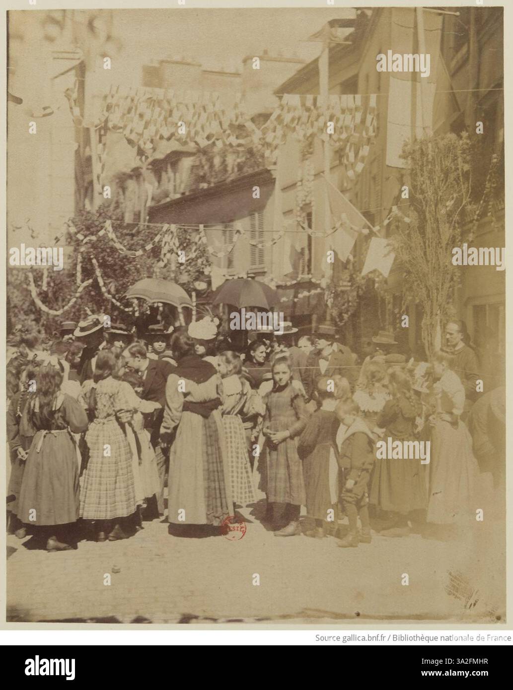 This photograph by Eugène Atget from July 14, 1899, captures a scene ...