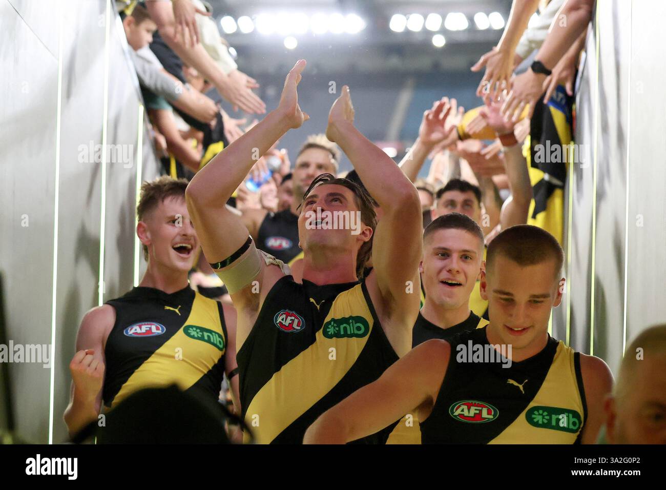 Melbourne, Australia. 13th Mar, 2025. The Tigers celebrate winning the ...
