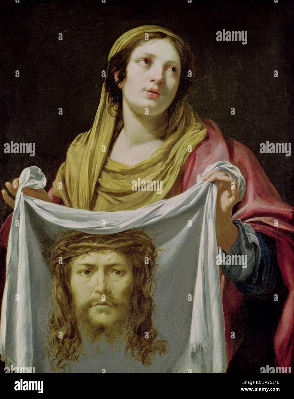 This painting by Simon Vouet depicts Saint Veronica holding the Holy Shroud. The religious theme ...