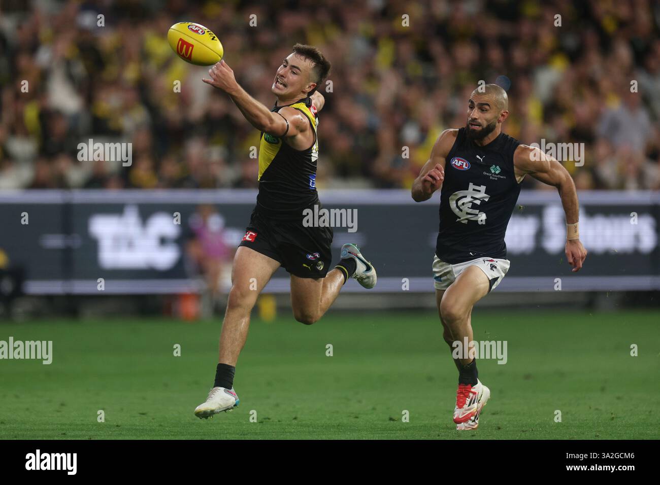 Melbourne, Australia. 13th Mar, 2025. Steely Green of the Tigers and ...