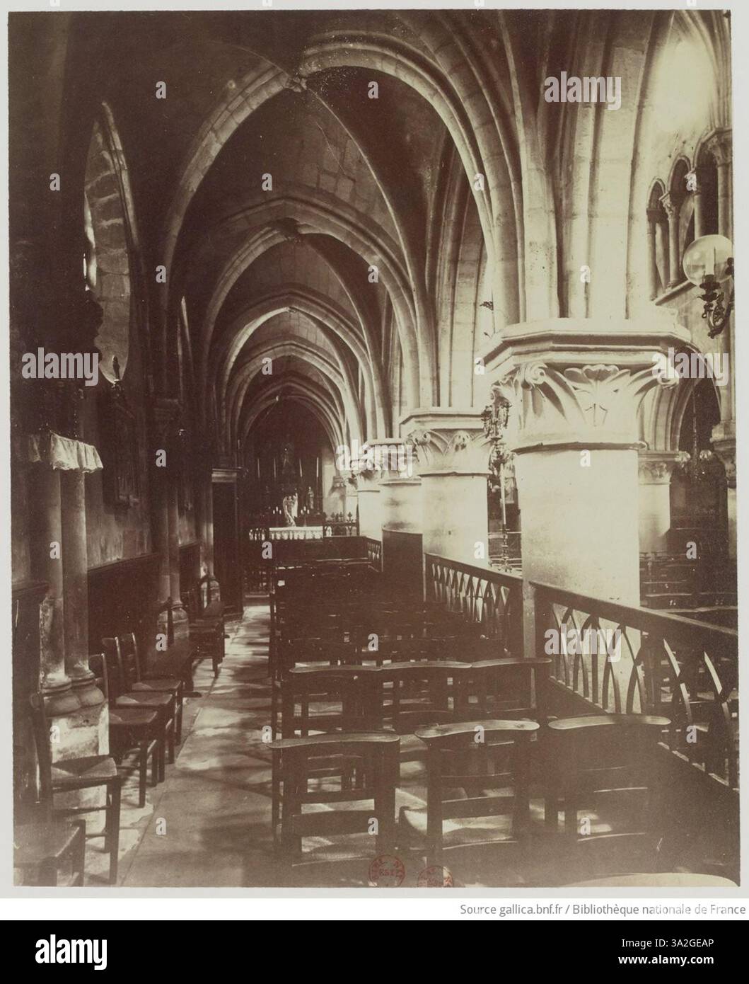 A photograph by Eugène Atget showing the interior of Église Saint-Denys ...